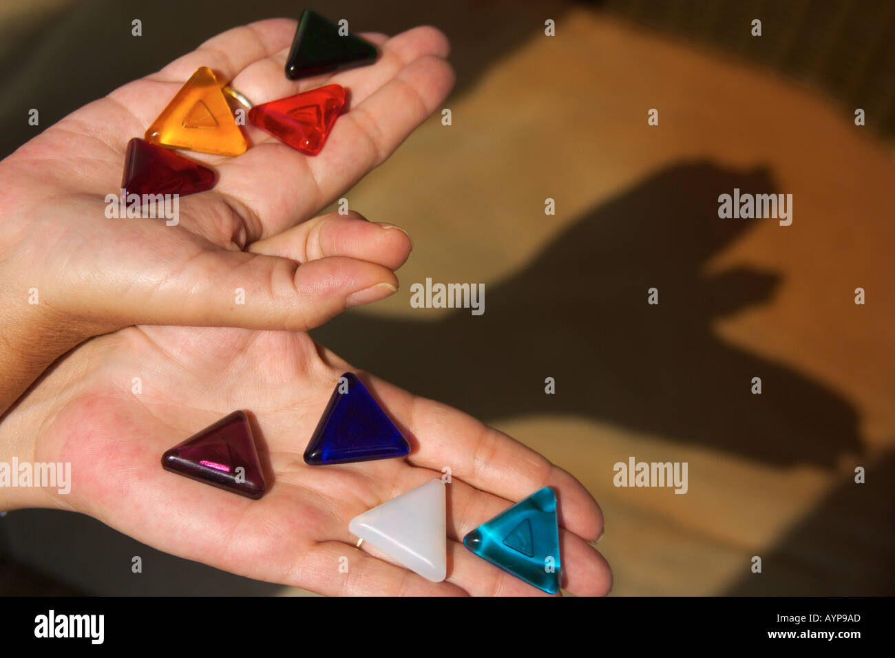 Female hands holding tachyon cells Stock Photo - Alamy