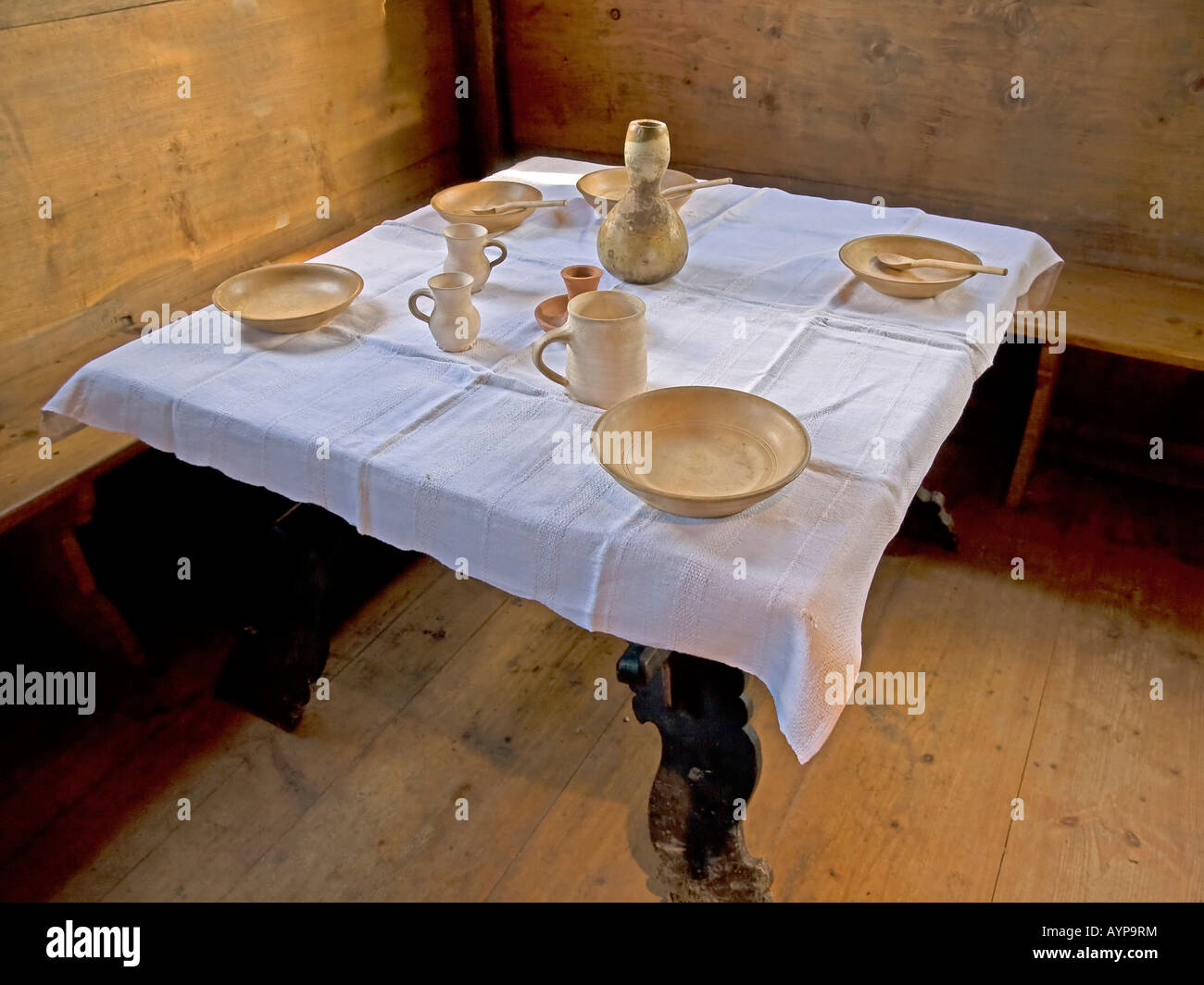 table with pottery interior view in an old house with original historic ...