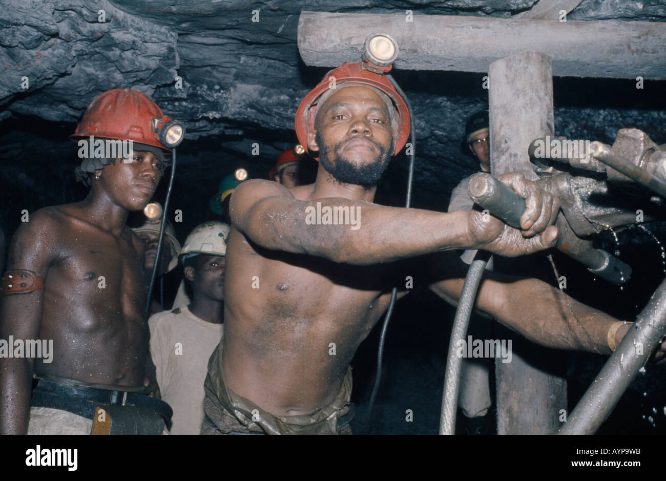 SOUTH AFRICA Industry Mining Gold miners working underground wearing ... SOUTH AFRICA Industry Mining Gold miners working underground wearing ...