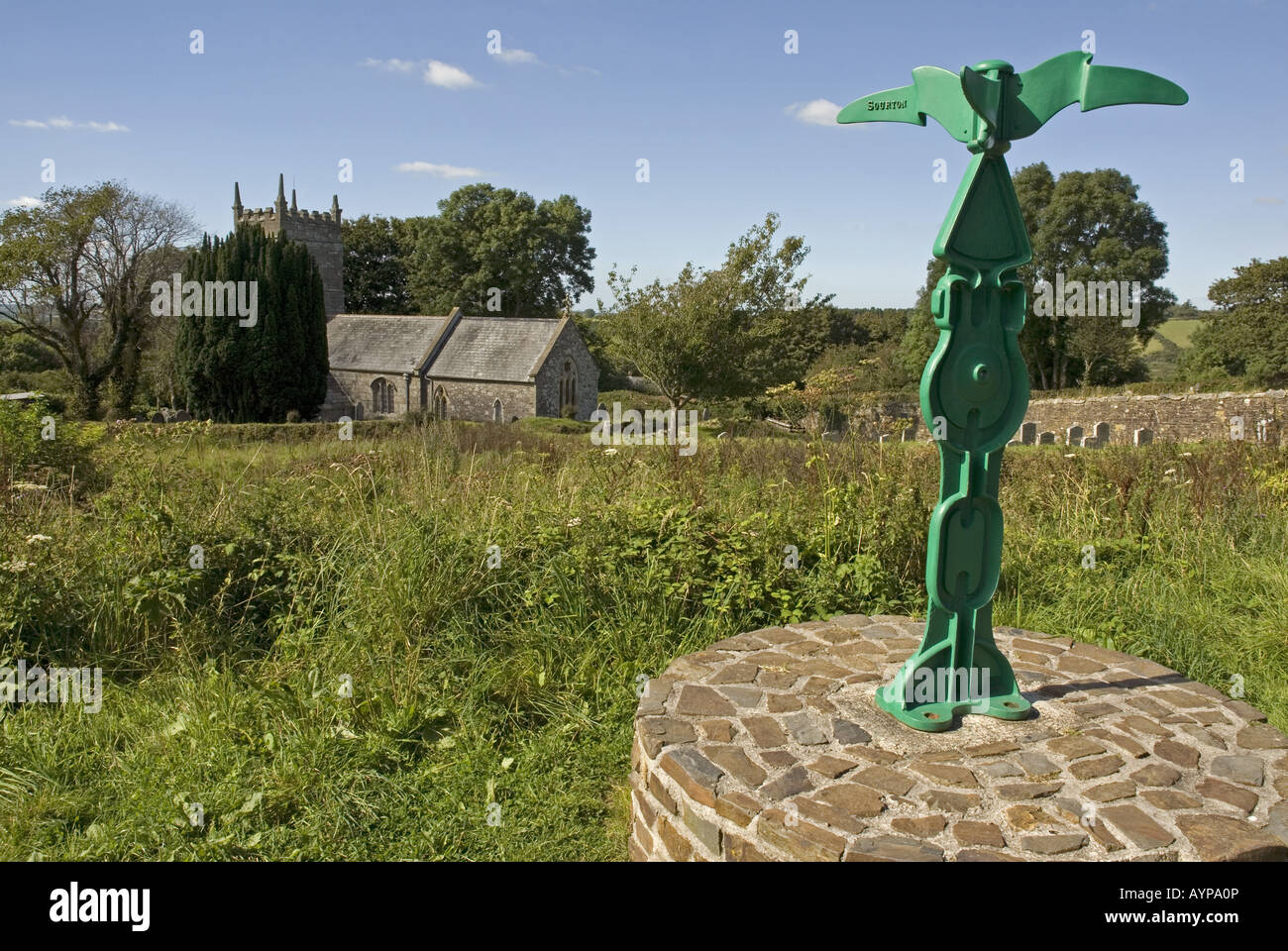 Church of St Thomas a Becket at Sourton and Granite Way signpost on the northwestern edge of ...