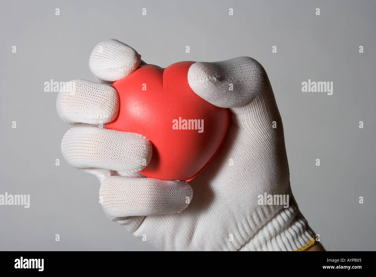 Red heart in white hand Stock Photo - Alamy