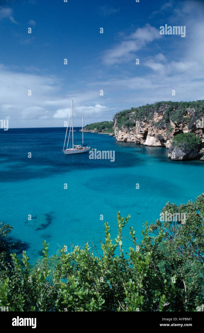 ANGUILLA Caribbean West Indies A yacht sailing on turquoise sea near ...