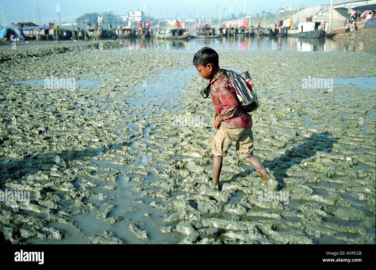 A river Gypsie Boy going to school Stock Photo - Alamy