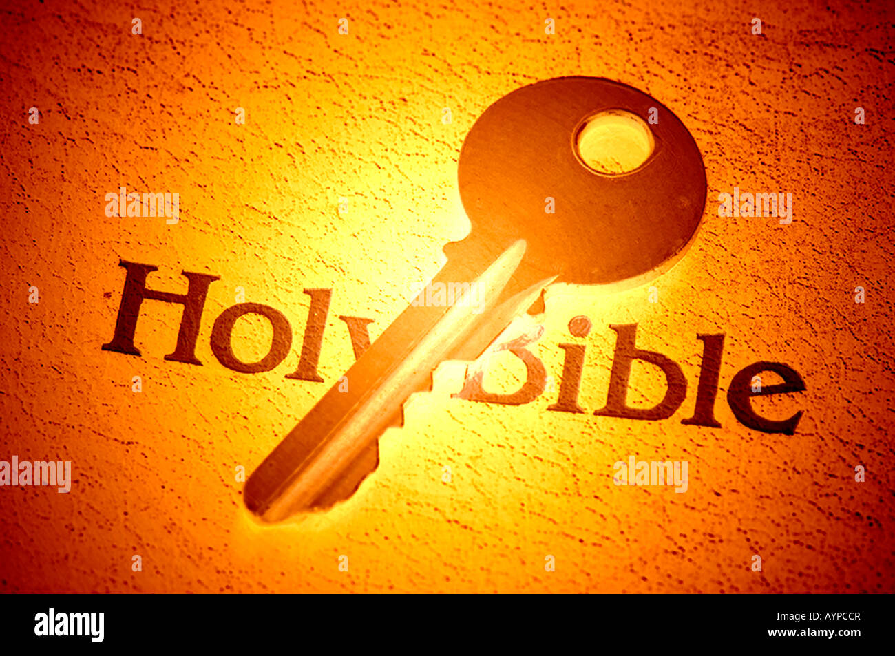 brass key on Holy Bible Stock Photo - Alamy