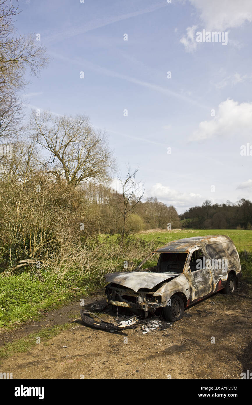 Dumped Burnt Out Van Stock Photo - Alamy