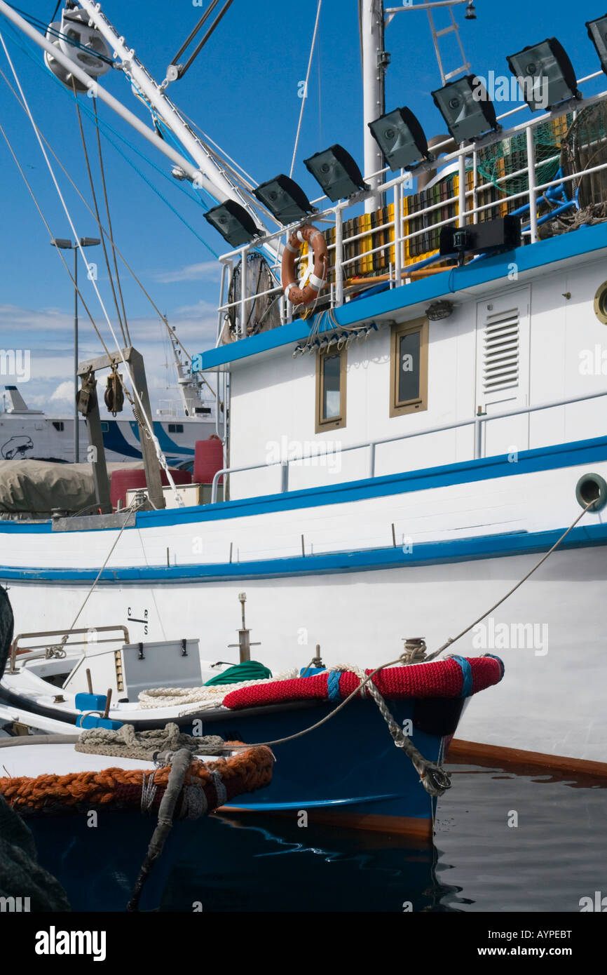Wooden trawler and accompanied boats, moored in Rijeka harbour in ...