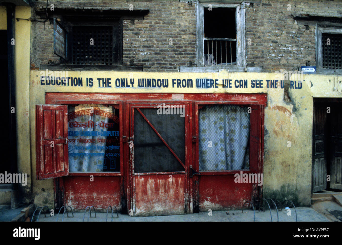 Very poor computer school in Kathmandu Valley with sign Education is ...