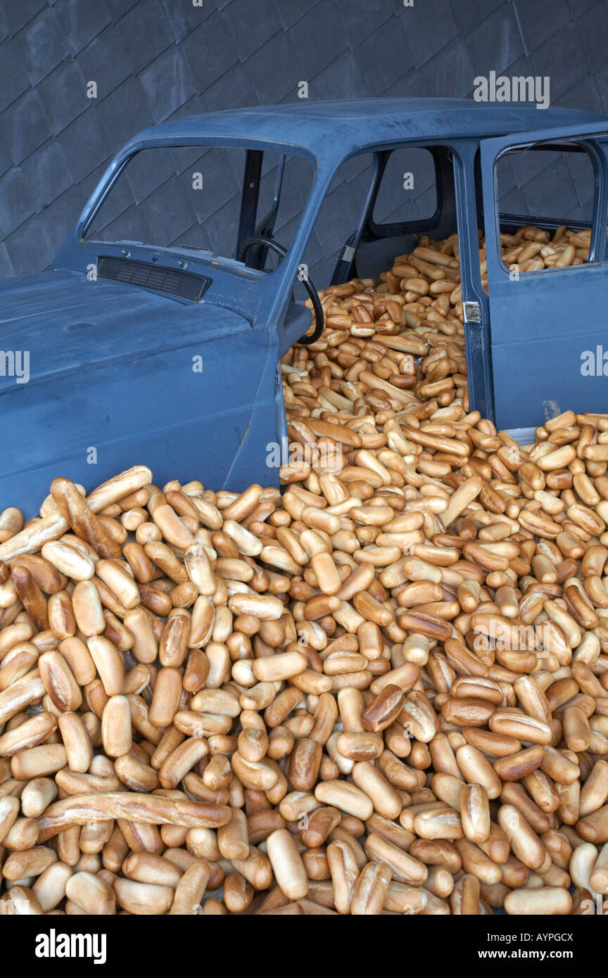 Old car filled with French bread on display in Rennes, Brittany, France ...