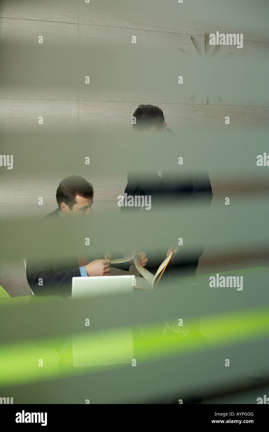 Two businessmen in an office Stock Photo - Alamy