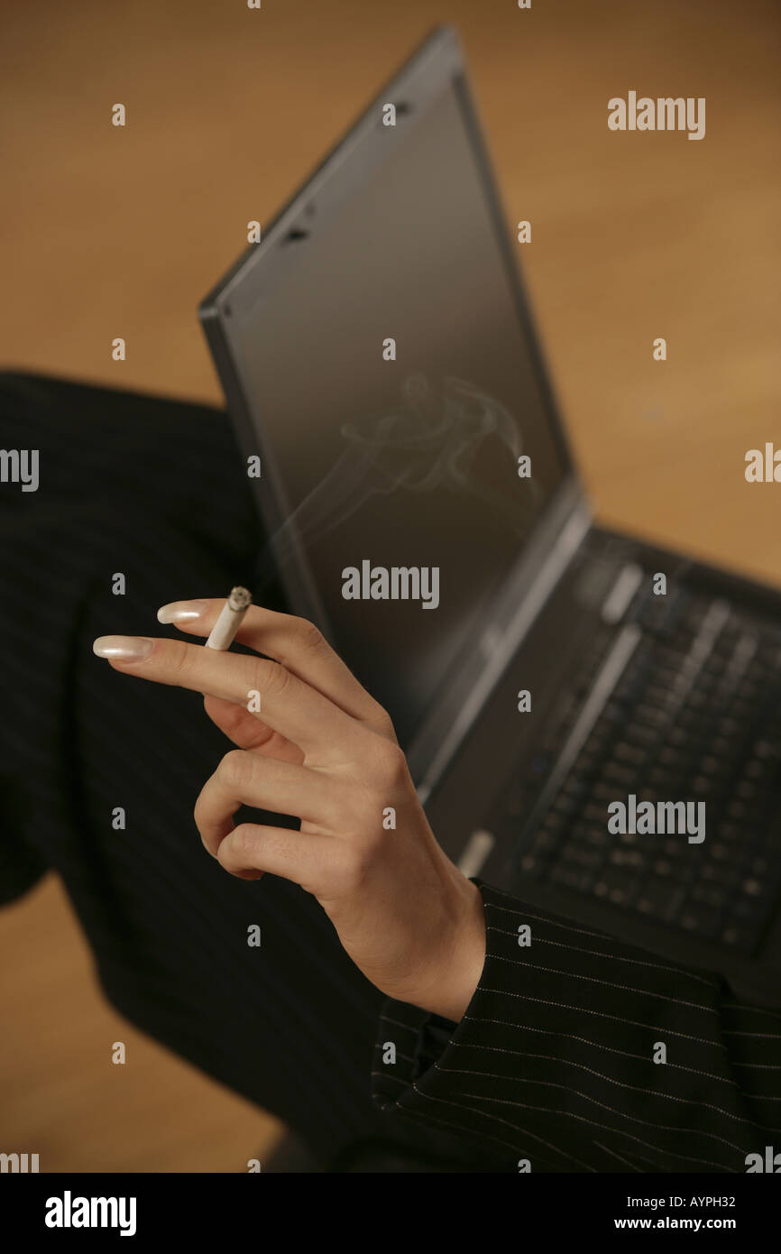 Woman with laptop on lap hi-res stock photography and images - Alamy