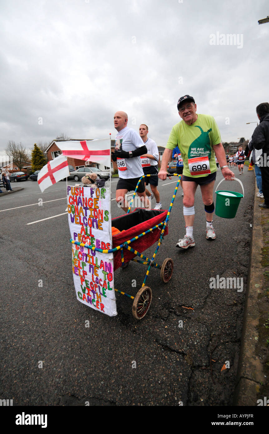 Man pushing pram collecting for charity Dronfield 10k run Sheffield ...