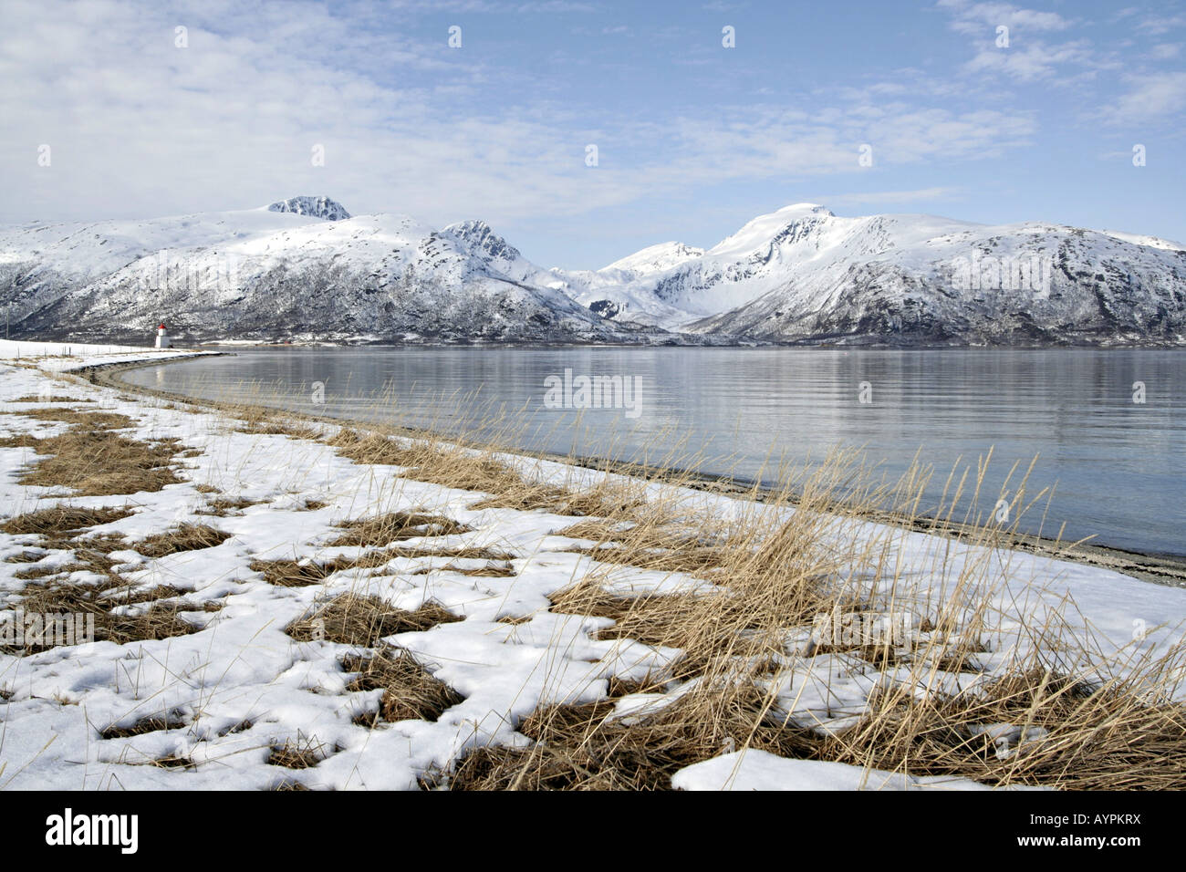 tromso beach spring thaw norway coast Stock Photo - Alamy