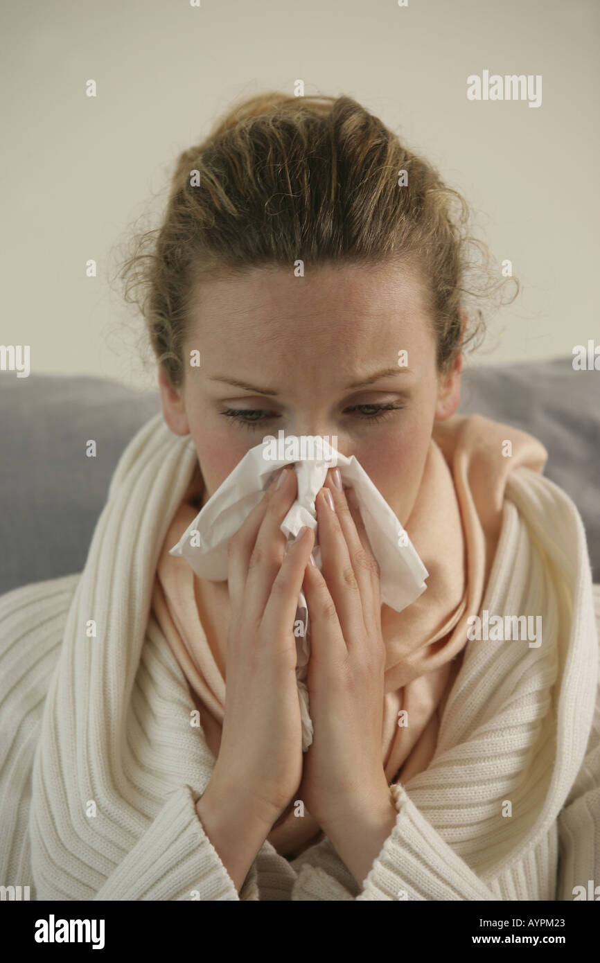 Woman wiping nose with hand hi-res stock photography and images - Alamy