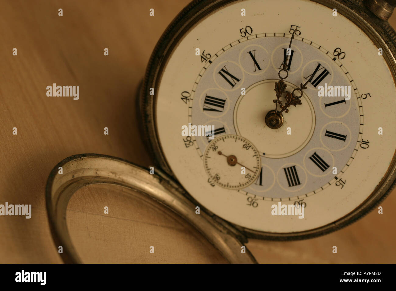 Circular glass cover of an pocket watch is opened as it is kept on the ...