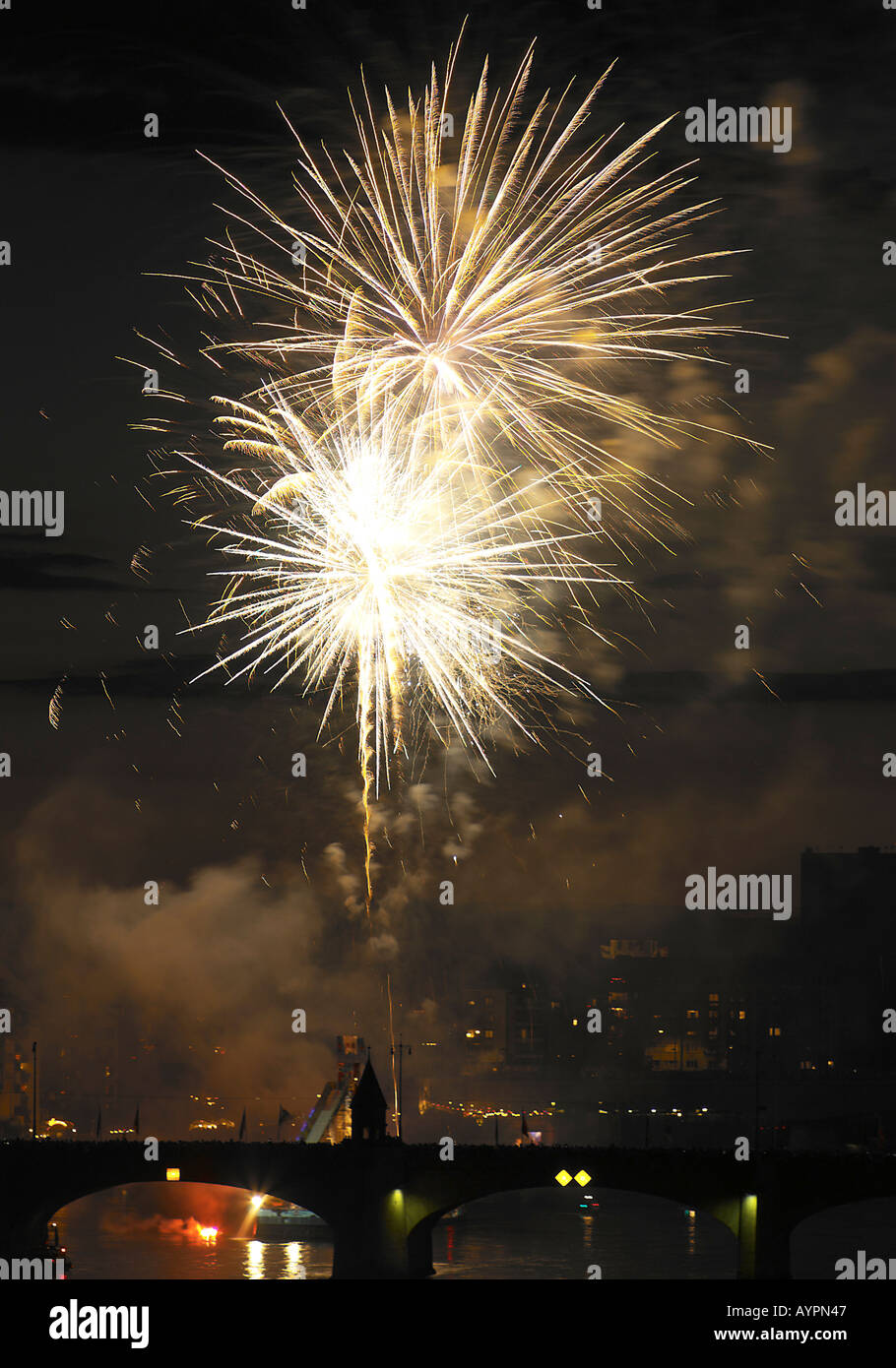 Fire crackers bursting in the sky over the bridge at night Stock Photo ...