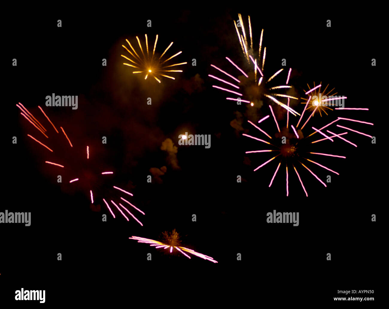 Fire crackers bursting in the sky at night Stock Photo - Alamy