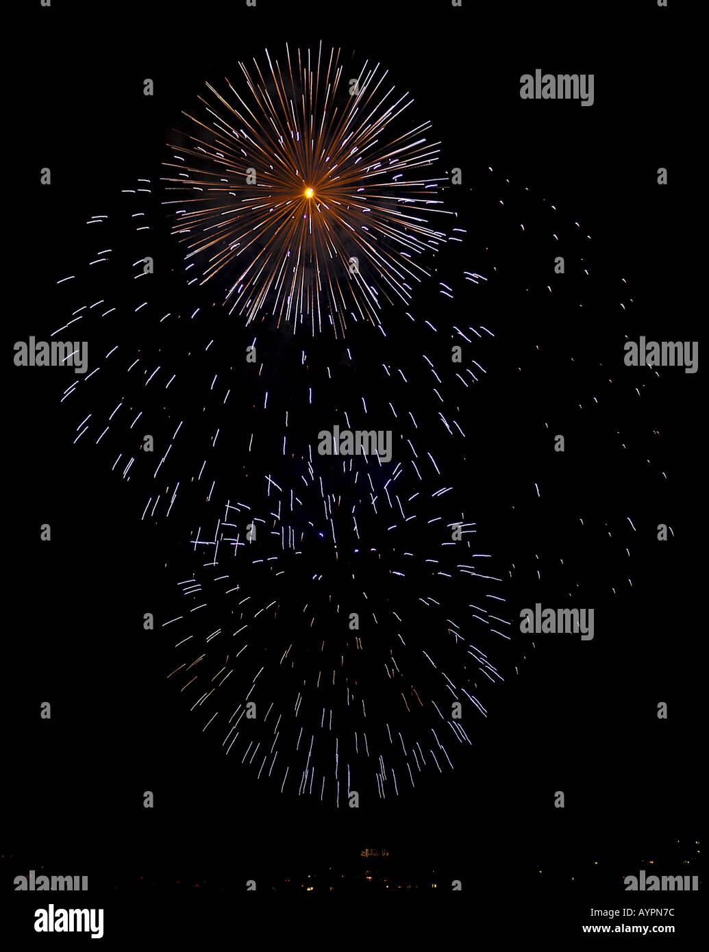 Fire crackers bursting in the sky at night Stock Photo - Alamy