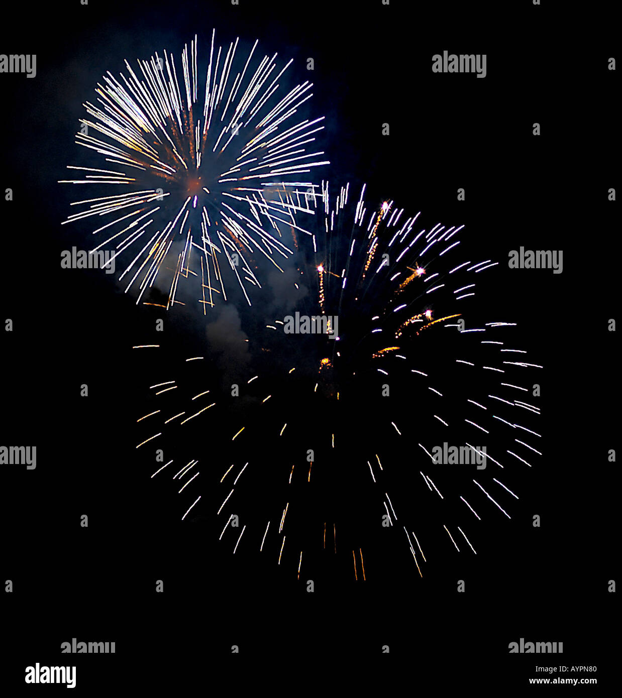Fire crackers bursting in the sky at night Stock Photo - Alamy