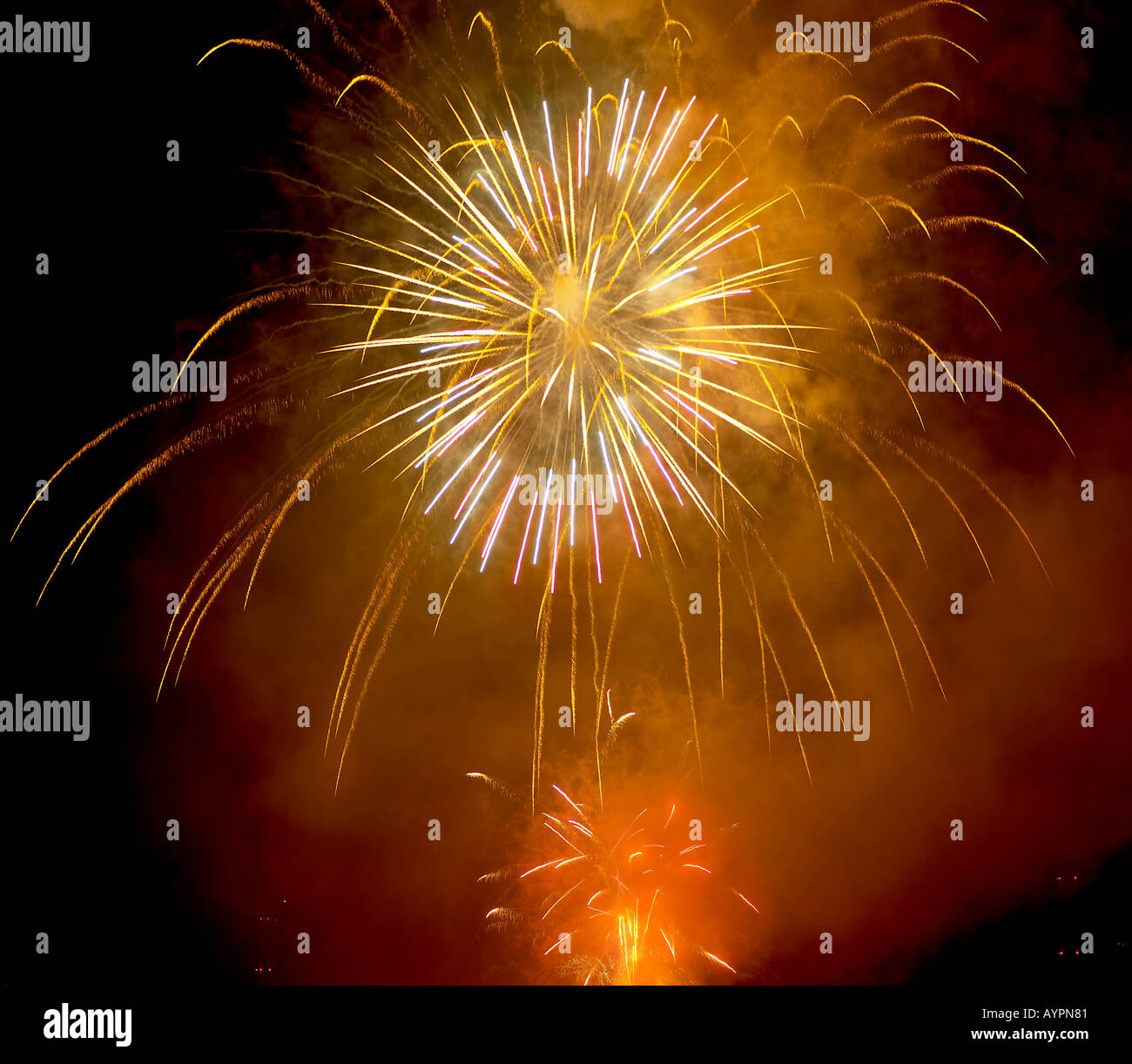 Fire crackers bursting in the sky at night Stock Photo - Alamy