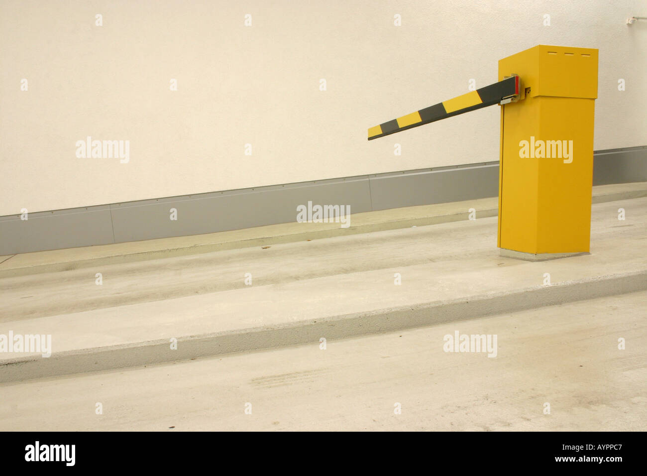 A horizontal bar seen used to stop the cars entering the parking lot ...