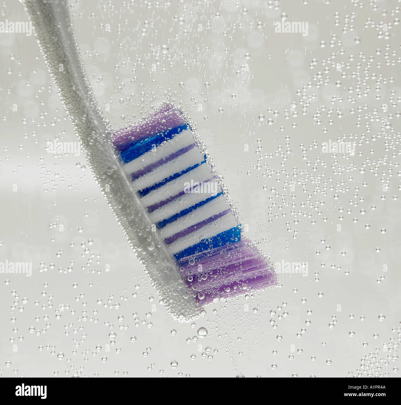 Toothbrush and bubbles hi-res stock photography and images - Alamy