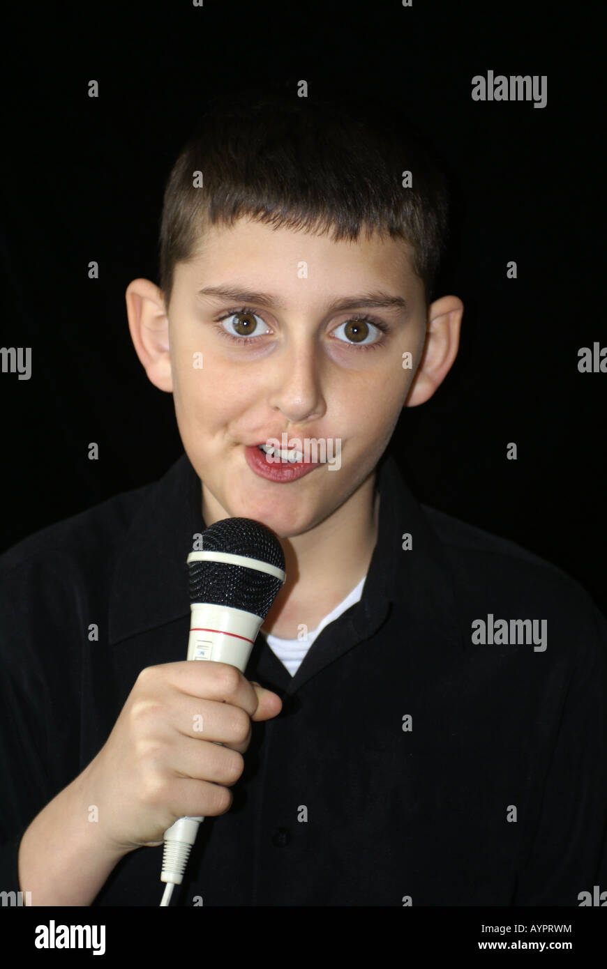 Child holding Microphone Stock Photo - Alamy