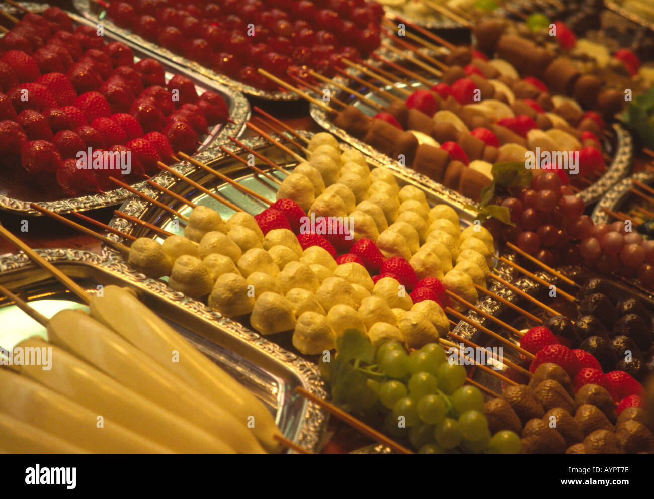 Sweets and fruit on sale at DOM fairground Hamburg Germany Stock Photo ...