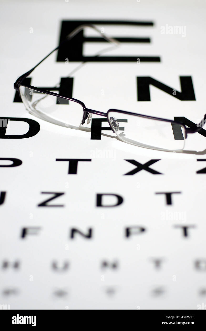Pair of spectacles with a Snellen eye test chart Stock Photo - Alamy