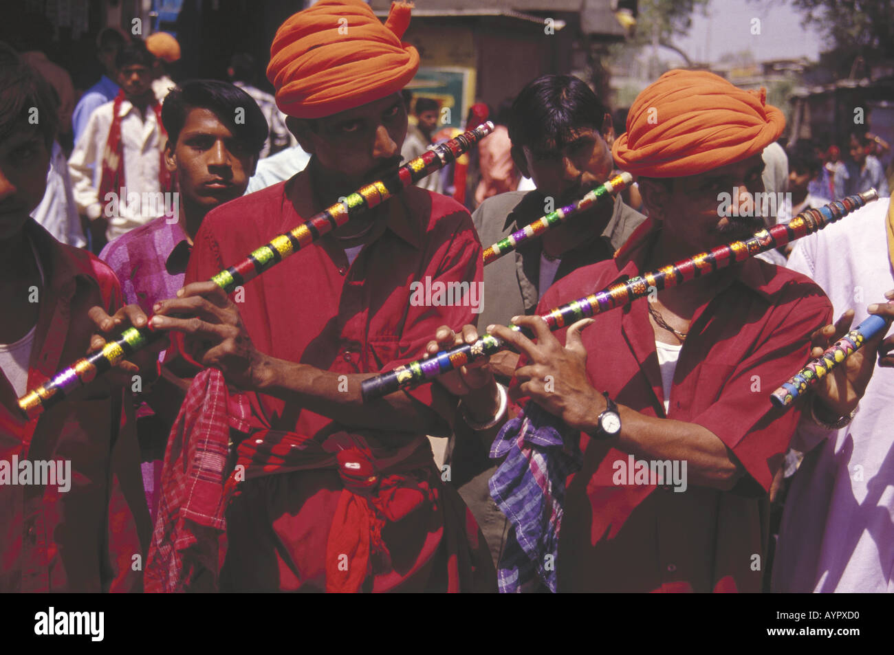Rethwa tribe boys with flutes Holi Festival Fair Kanvat Gujarat India ...
