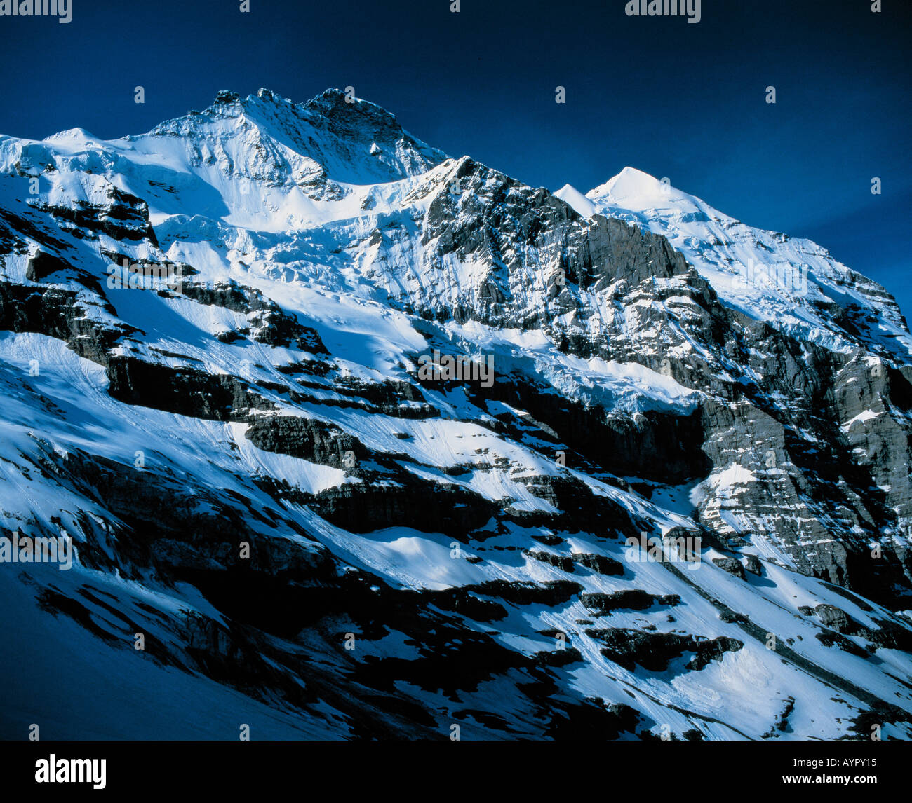 Rugged Mountain with Snow Stock Photo - Alamy