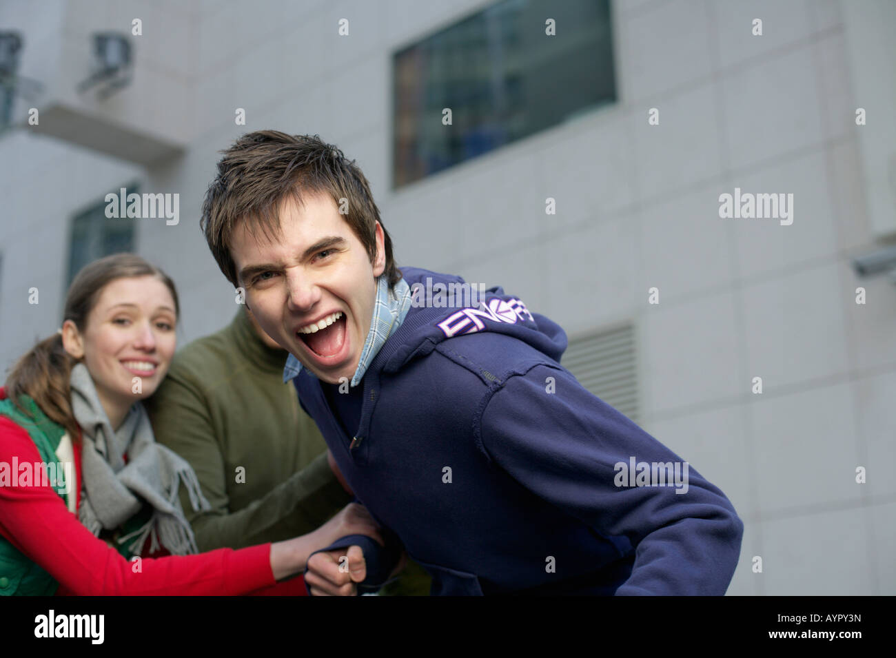 Young man yelling at camera Stock Photo - Alamy