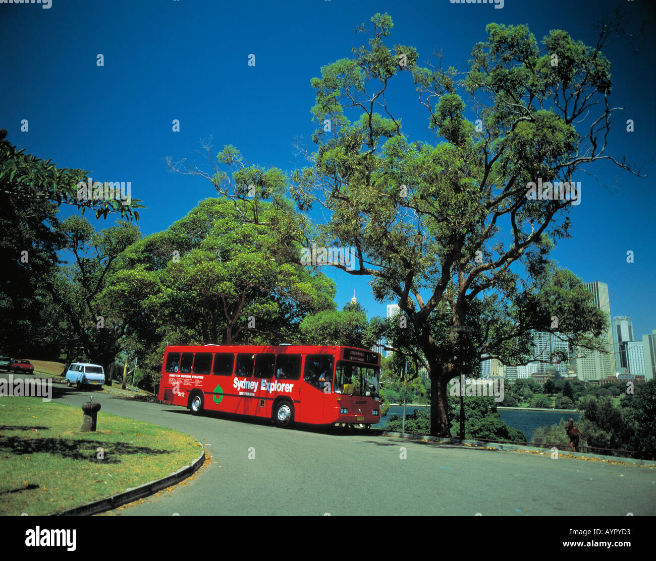 Red Bus on Road Stock Photo - Alamy