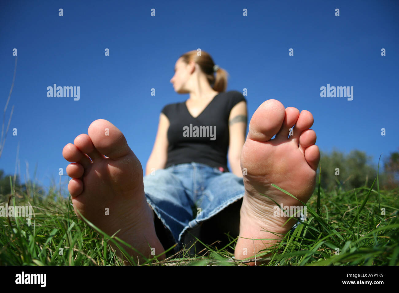 lady with feet forward Stock Photo - Alamy