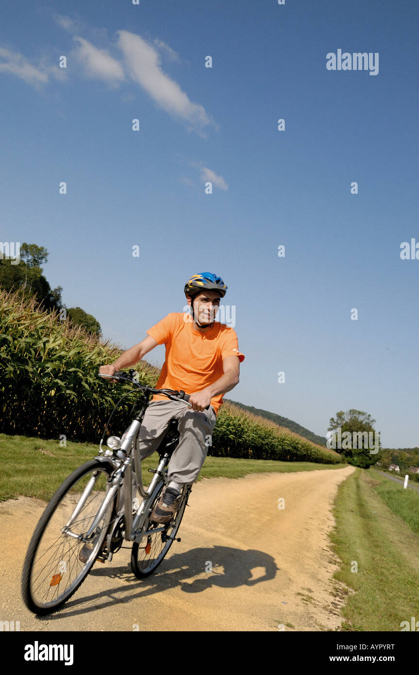 Young man biking on nature, Normandy, France Stock Photo - Alamy