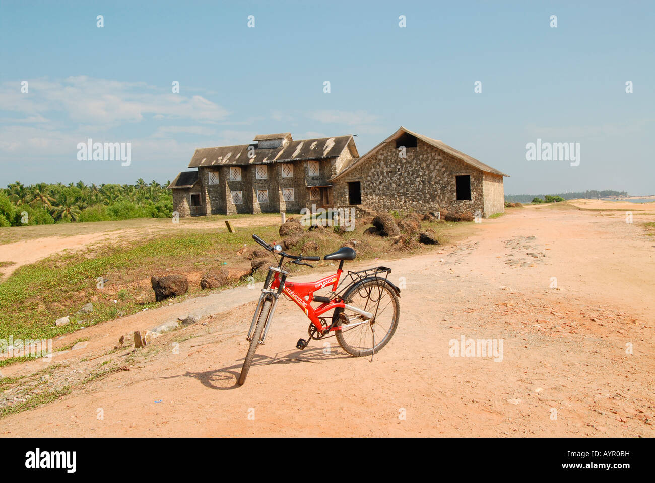 A cycle in front of an old house Stock Photo - Alamy