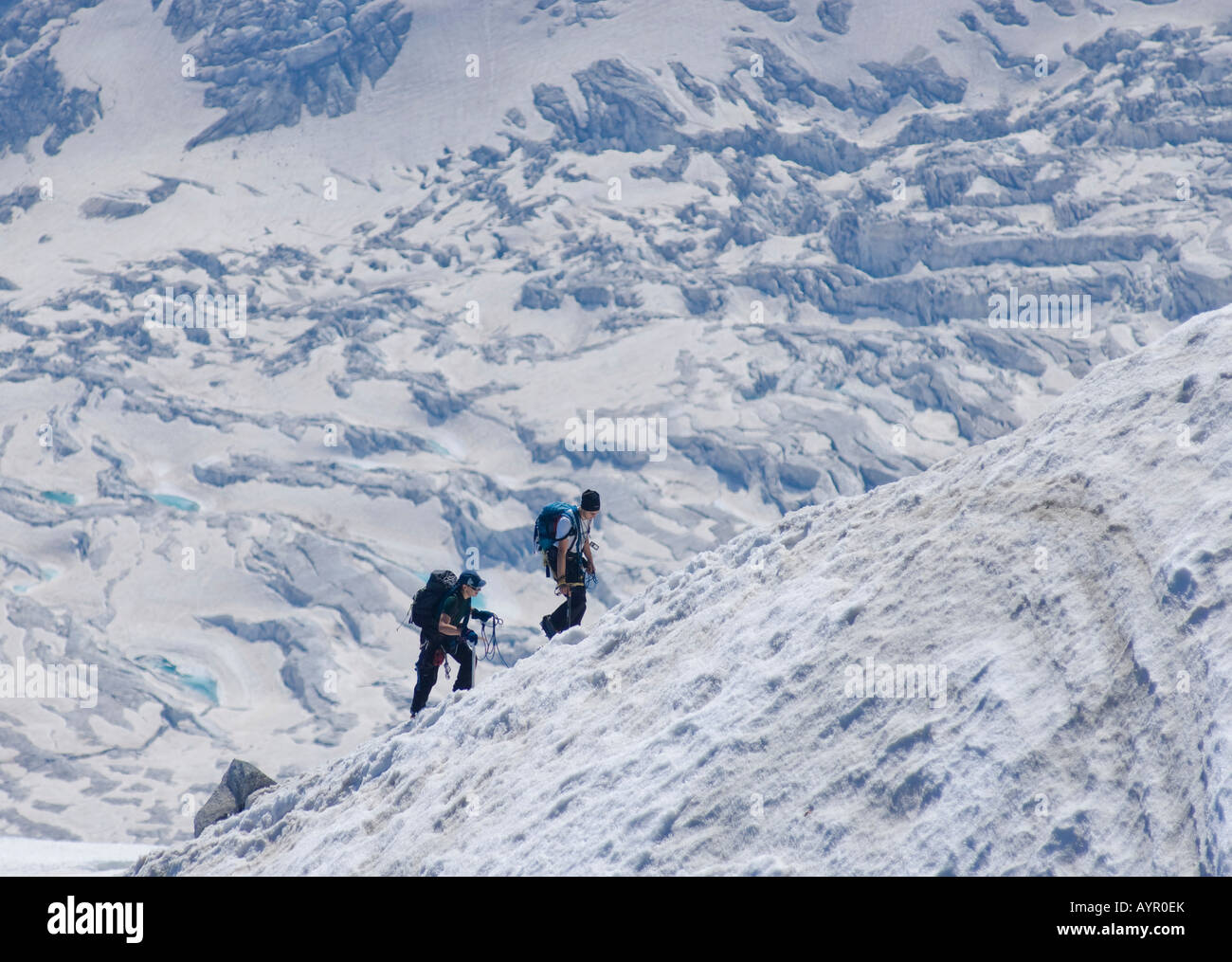 Mountain climbers climbing Col du Midi (Midi Pass), Mt. Aiguille du ...