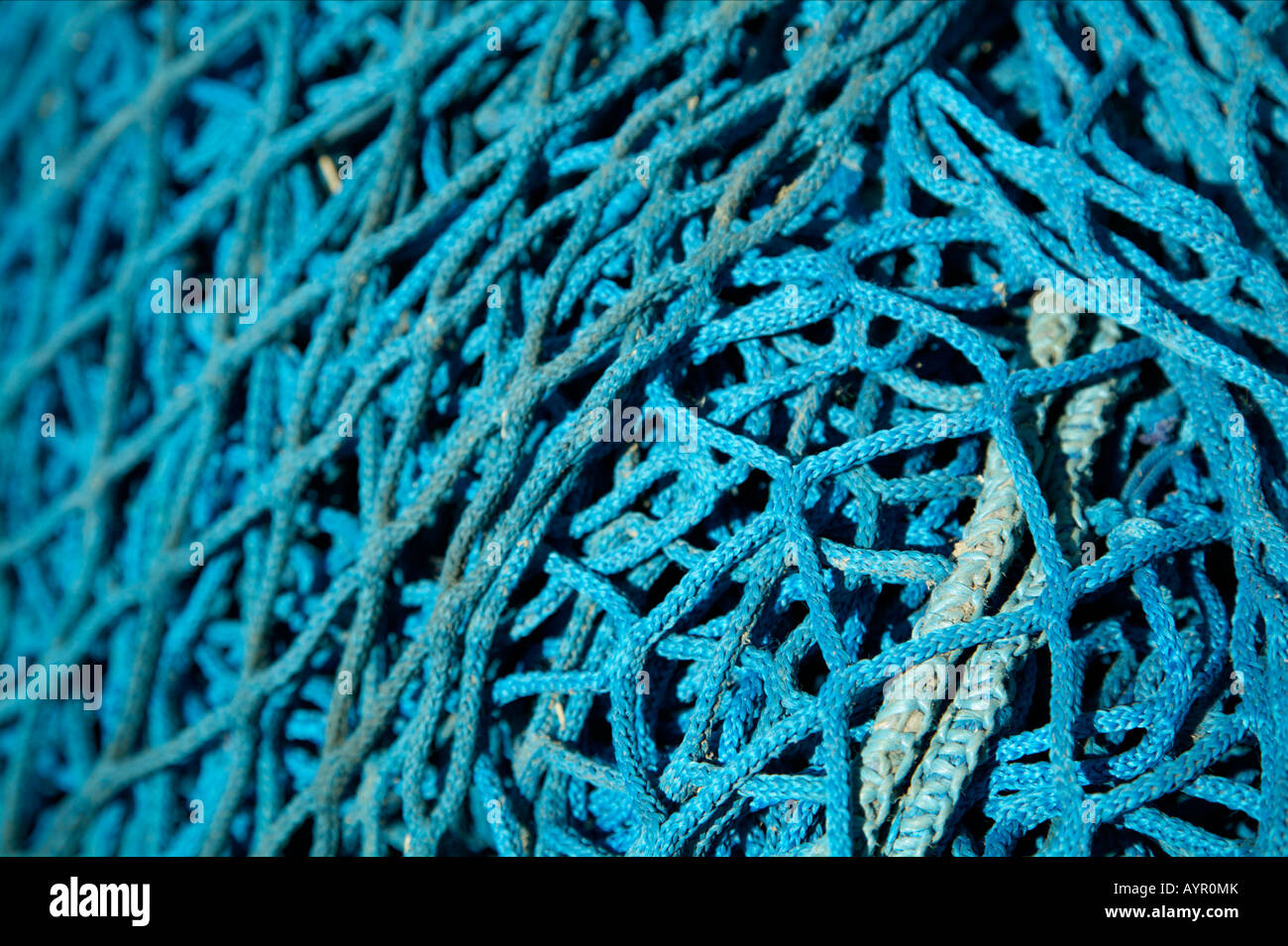 Blue fishing net, part of Stock Photo - Alamy