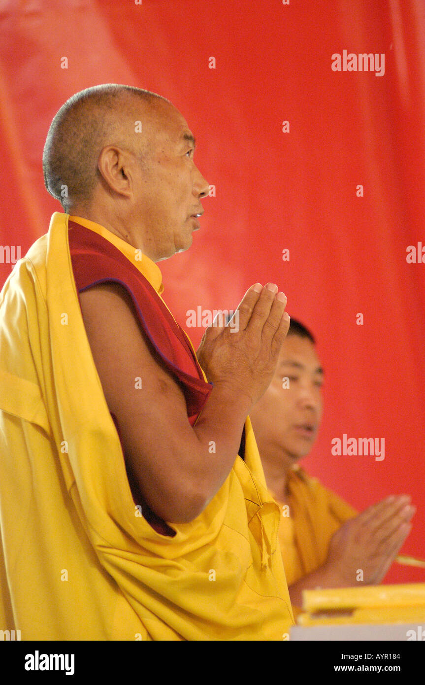 Tibetan monks praying Stock Photo - Alamy