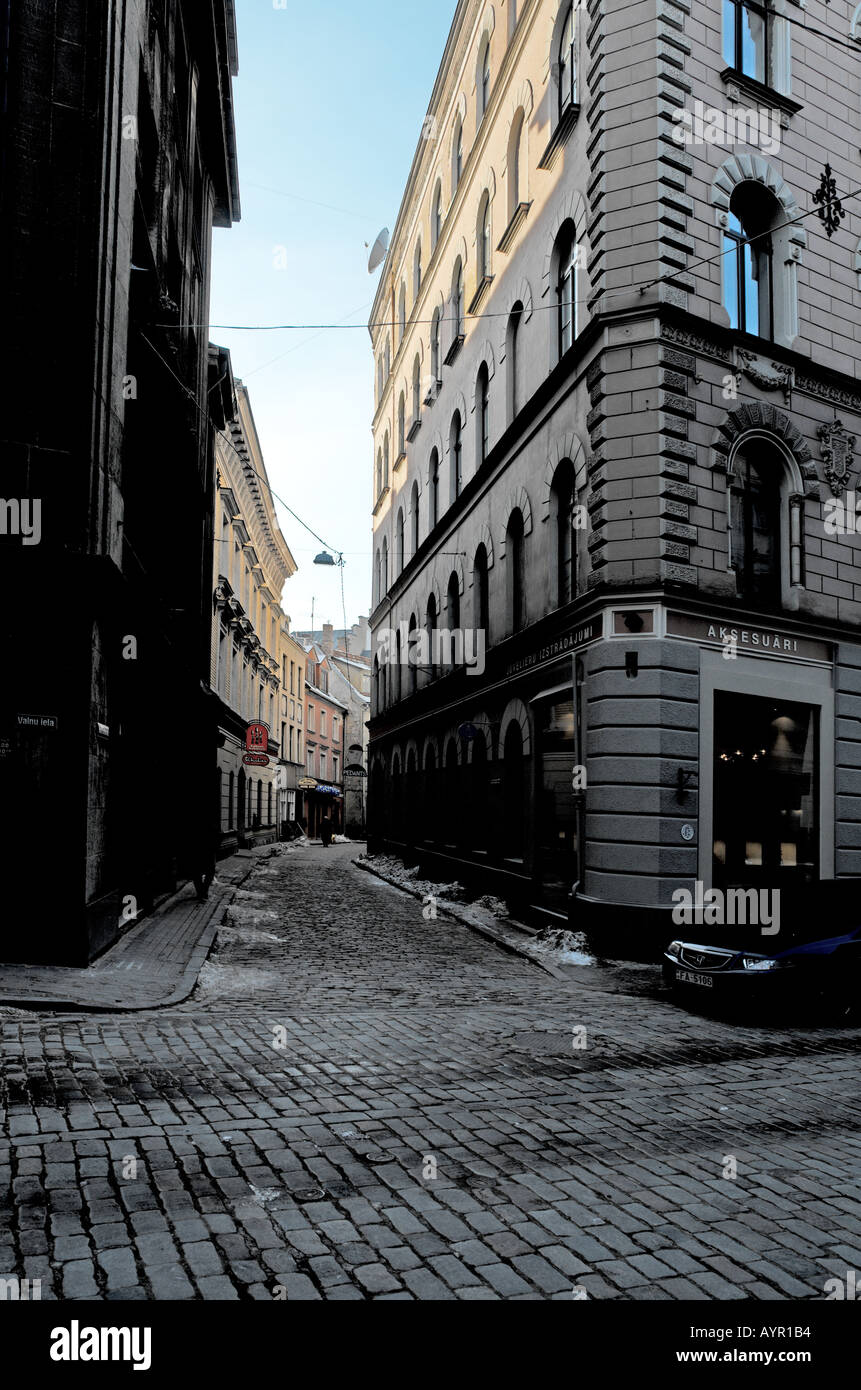 city street old town cobbles narrow dark winter cold Stock Photo - Alamy