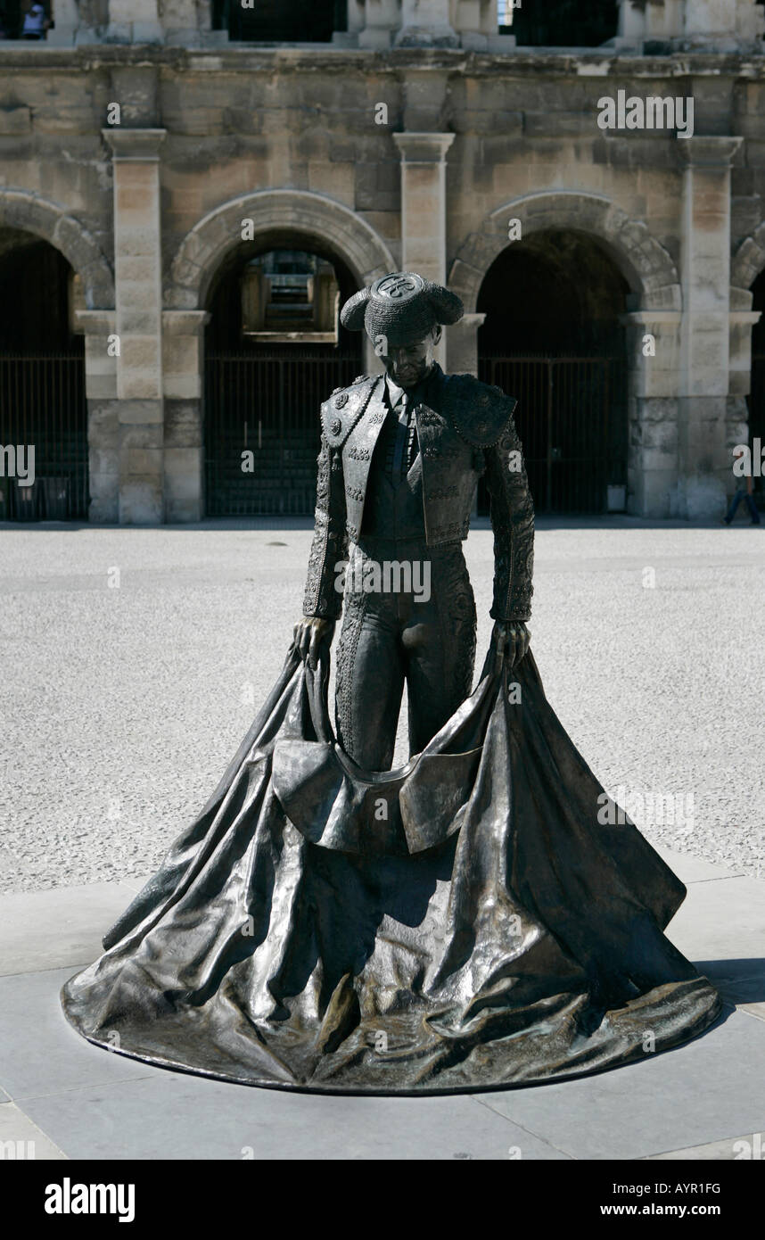 Bronze statue of a Matador outside the amphitheatre at Nimes, Bouches ...
