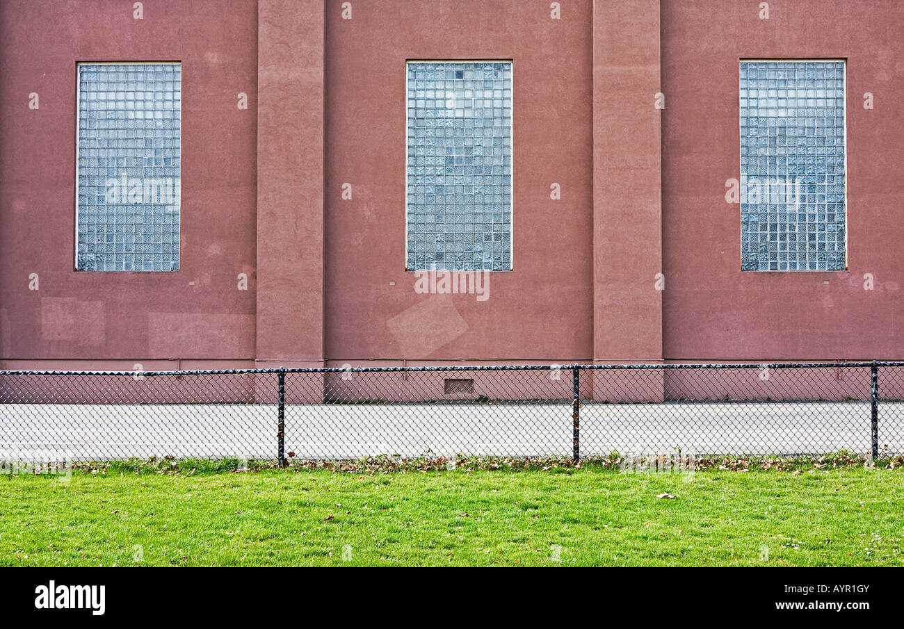 windows on warehouse wall Stock Photo - Alamy