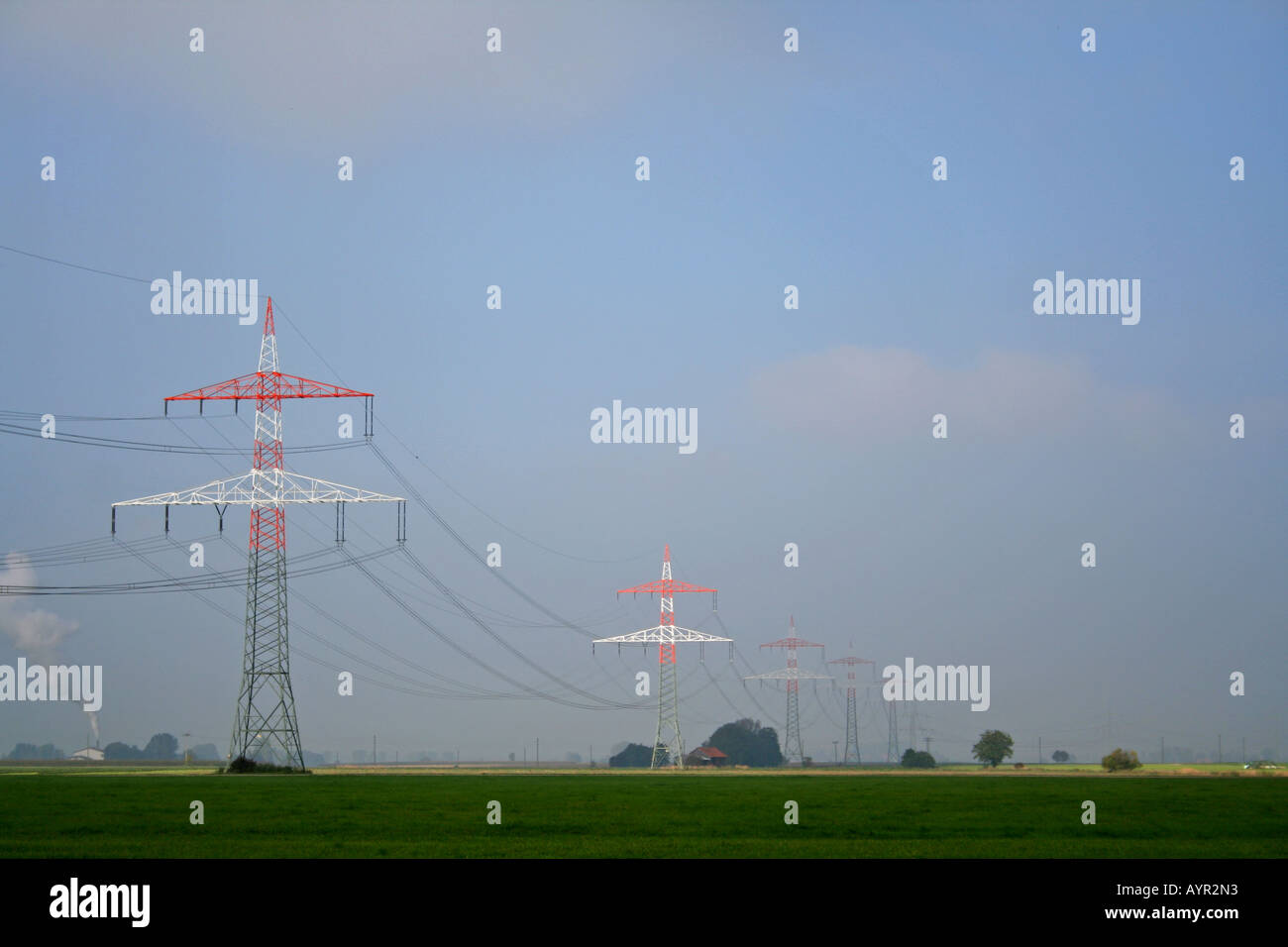 red and white electric pylons disappearing into the distance Stock ...