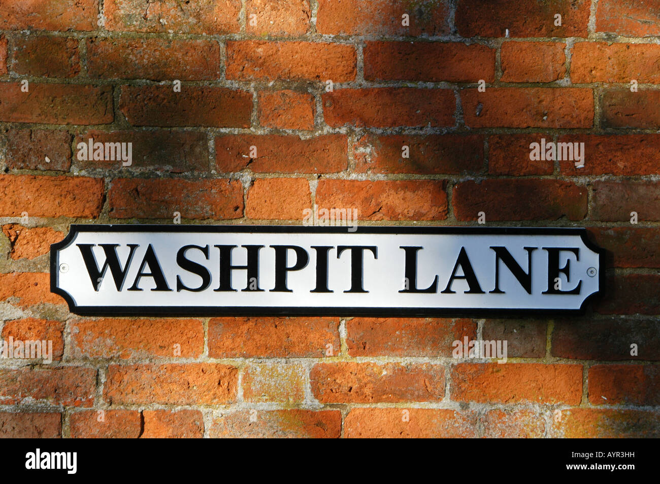 traditional road name street sign in a village in england Stock Photo ...