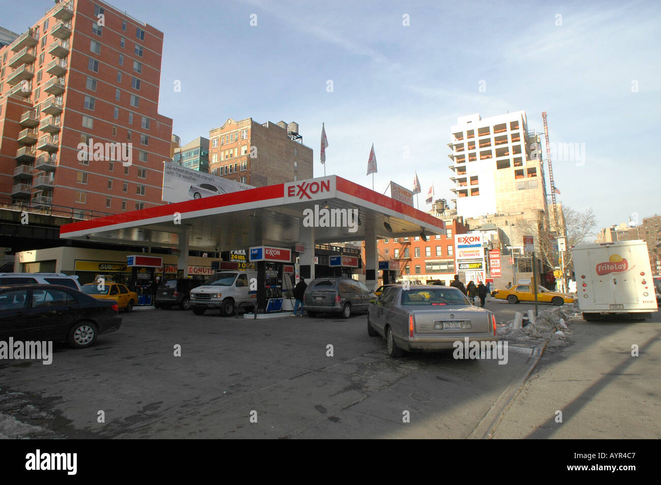 Cars line up at Exxon Gas Station 23 rd Street at 10th Ave Stock Photo ...