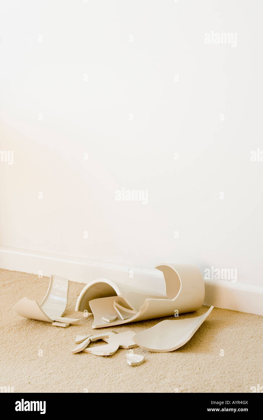 broken ceramic pot on floor Stock Photo - Alamy