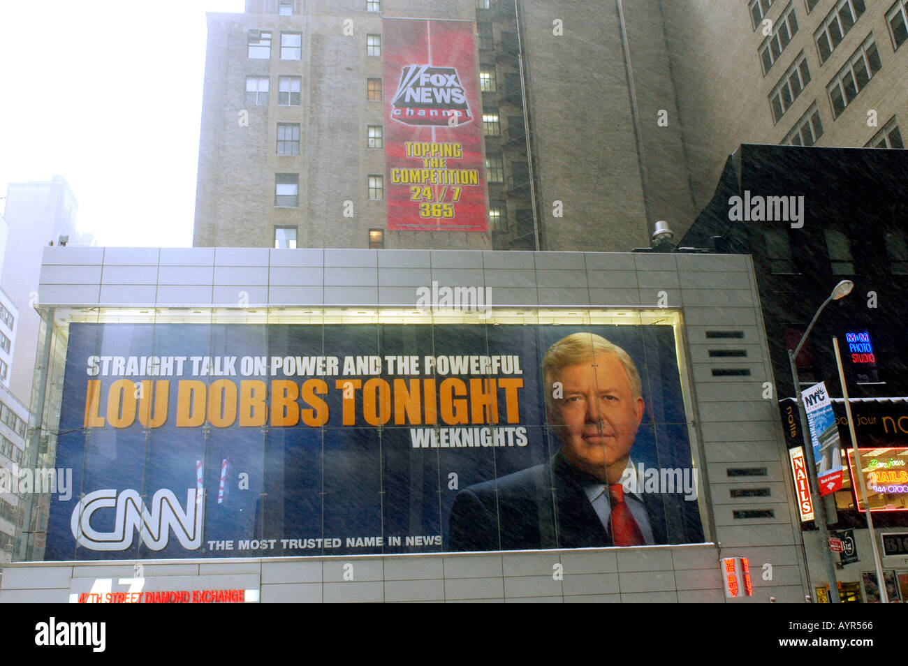 An ad for Fox News next to an ad for CNN on Sixth Ave opposite the CNN ...