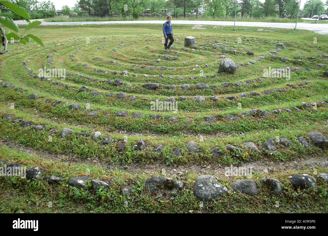 Boy walking in the Bunge stone labyrinth in Gotland Sweden Stock Photo ...