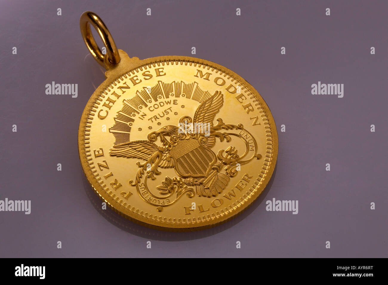A shining chinese gold coin Stock Photo - Alamy