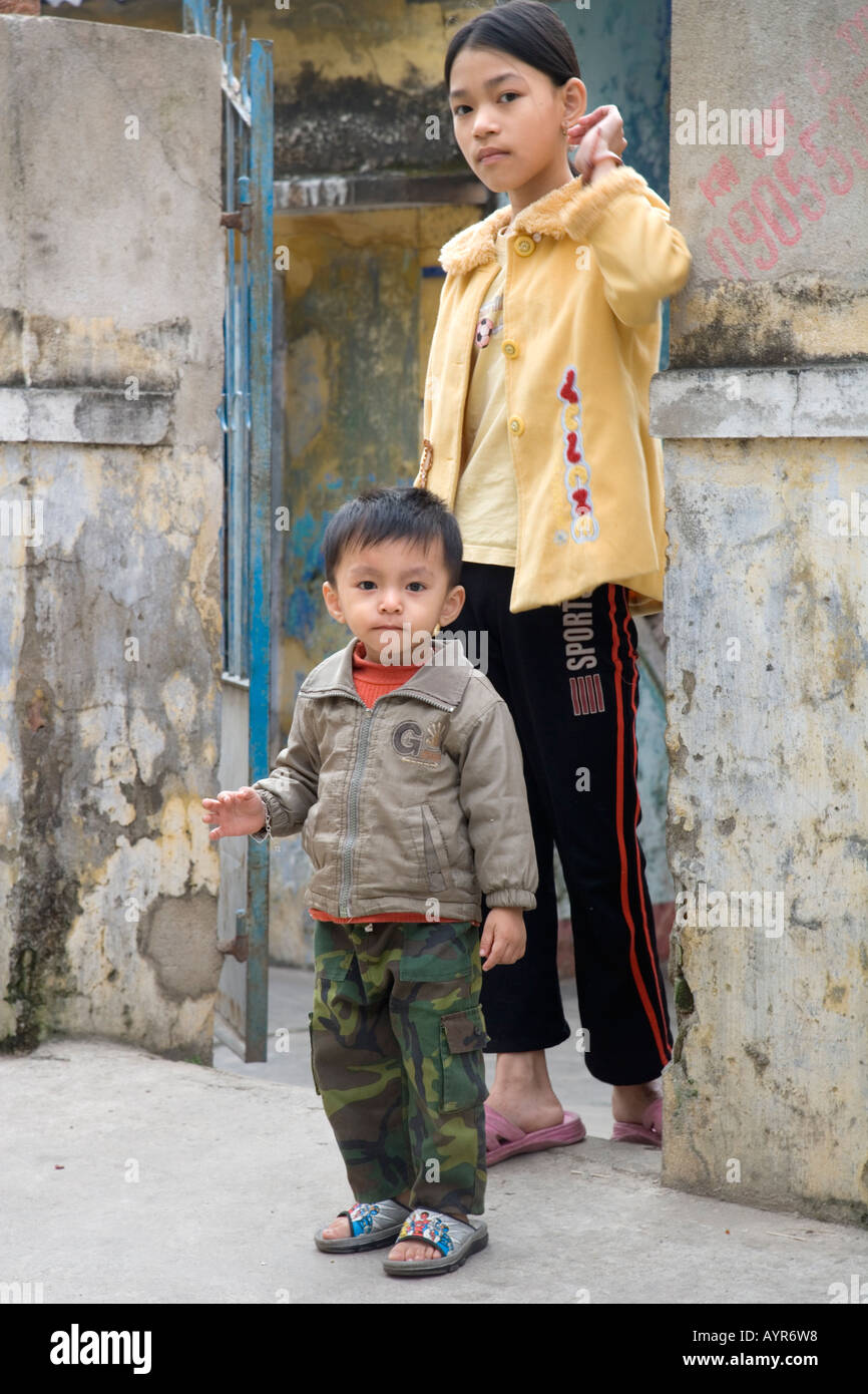 Two Vietnamese children outside their home, Danang, Vietnam Stock Photo ...