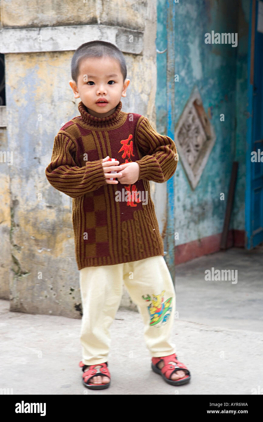Young Vietnamese boy in street, Danang, Vietnam Stock Photo - Alamy